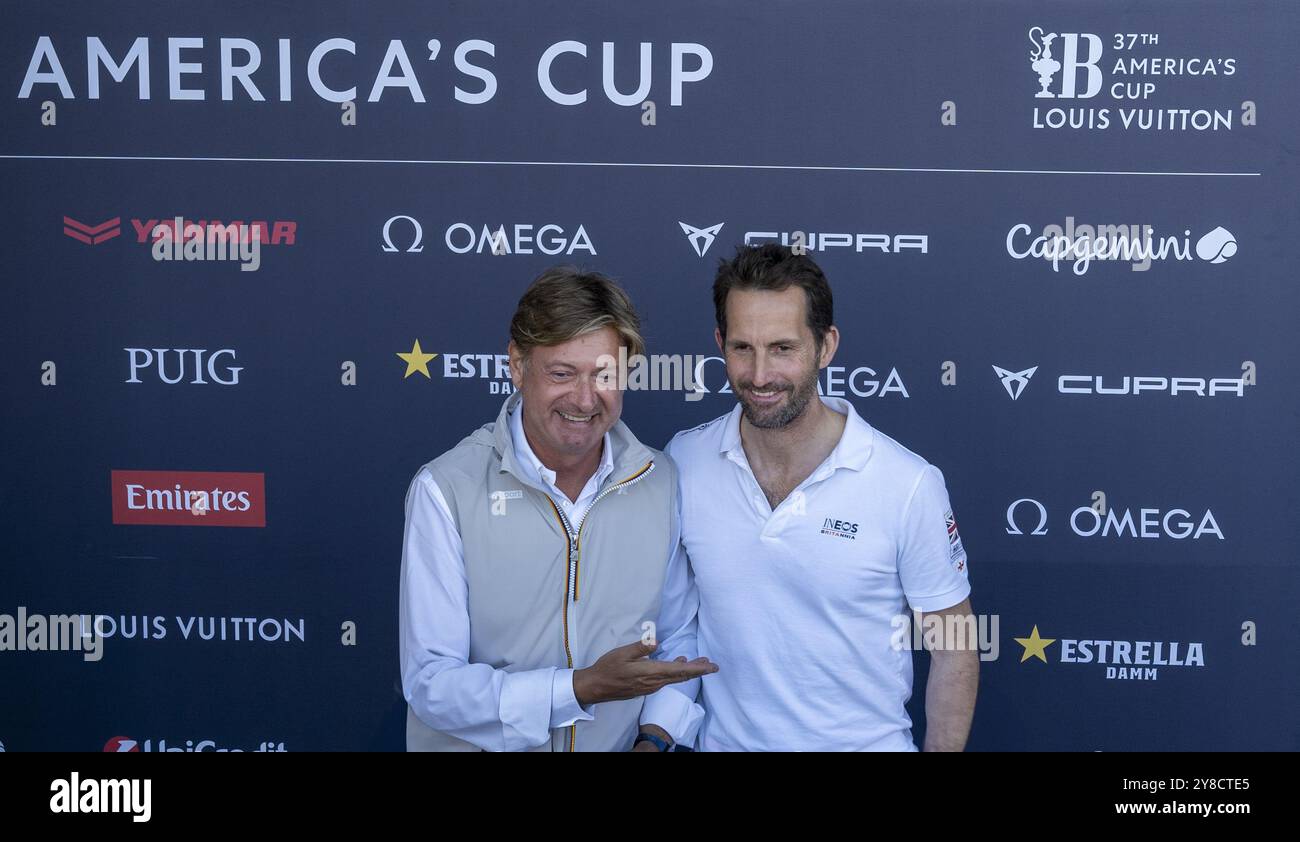 Ben Ainsley and member of media posing for pictures at press press ...