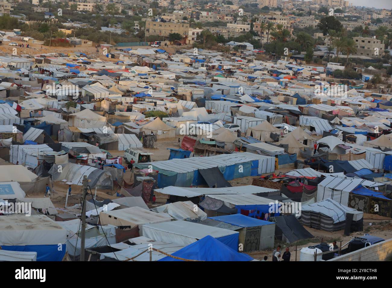 Tents are crammed together as displaced Palestinians camp on the beach ...