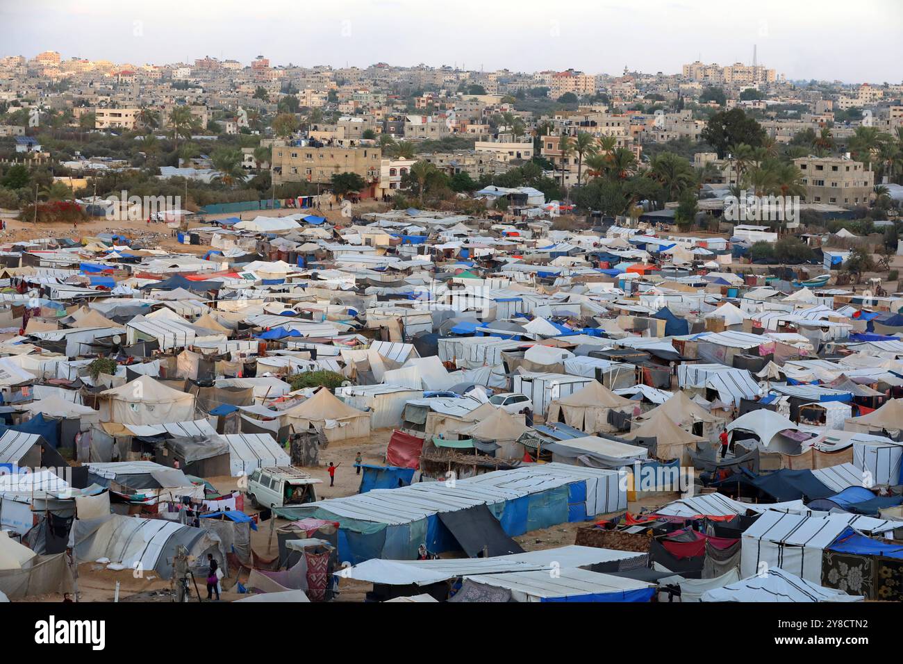 Tents are crammed together as displaced Palestinians camp on the beach ...