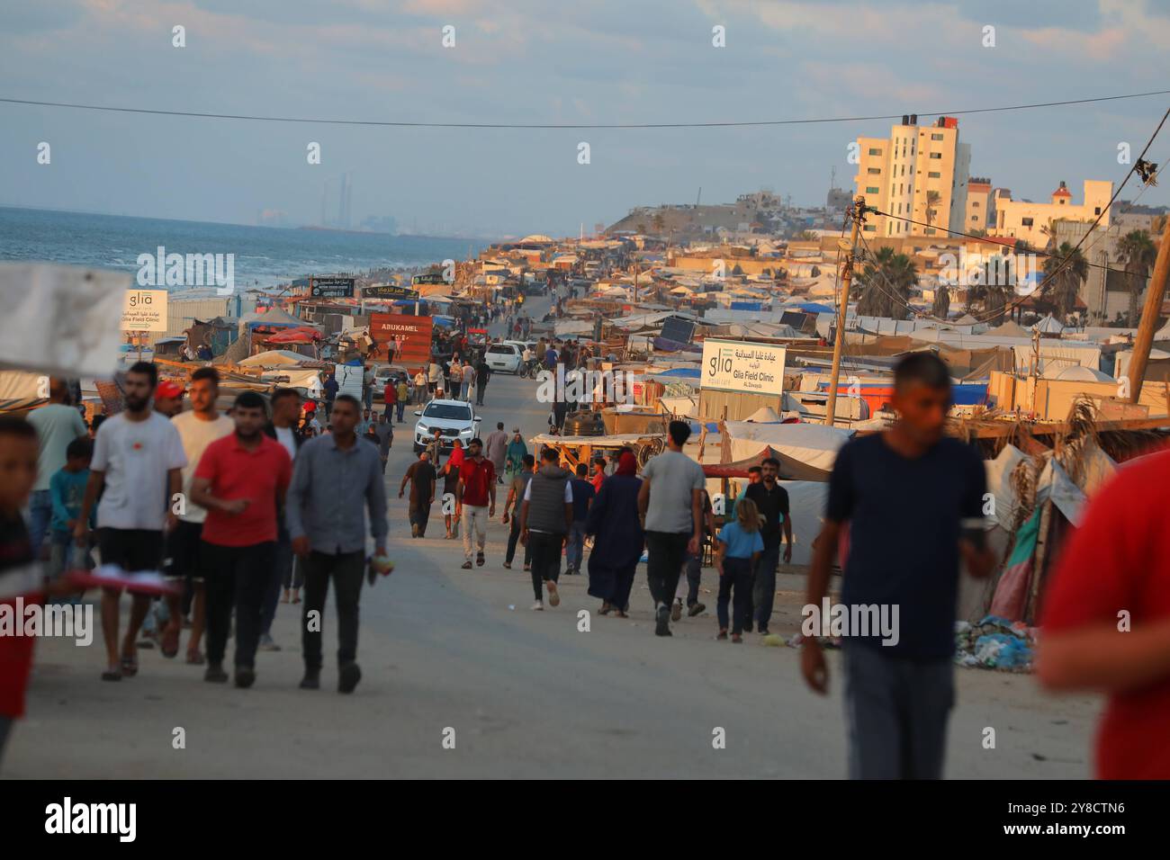 Tents are crammed together as displaced Palestinians camp on the beach ...