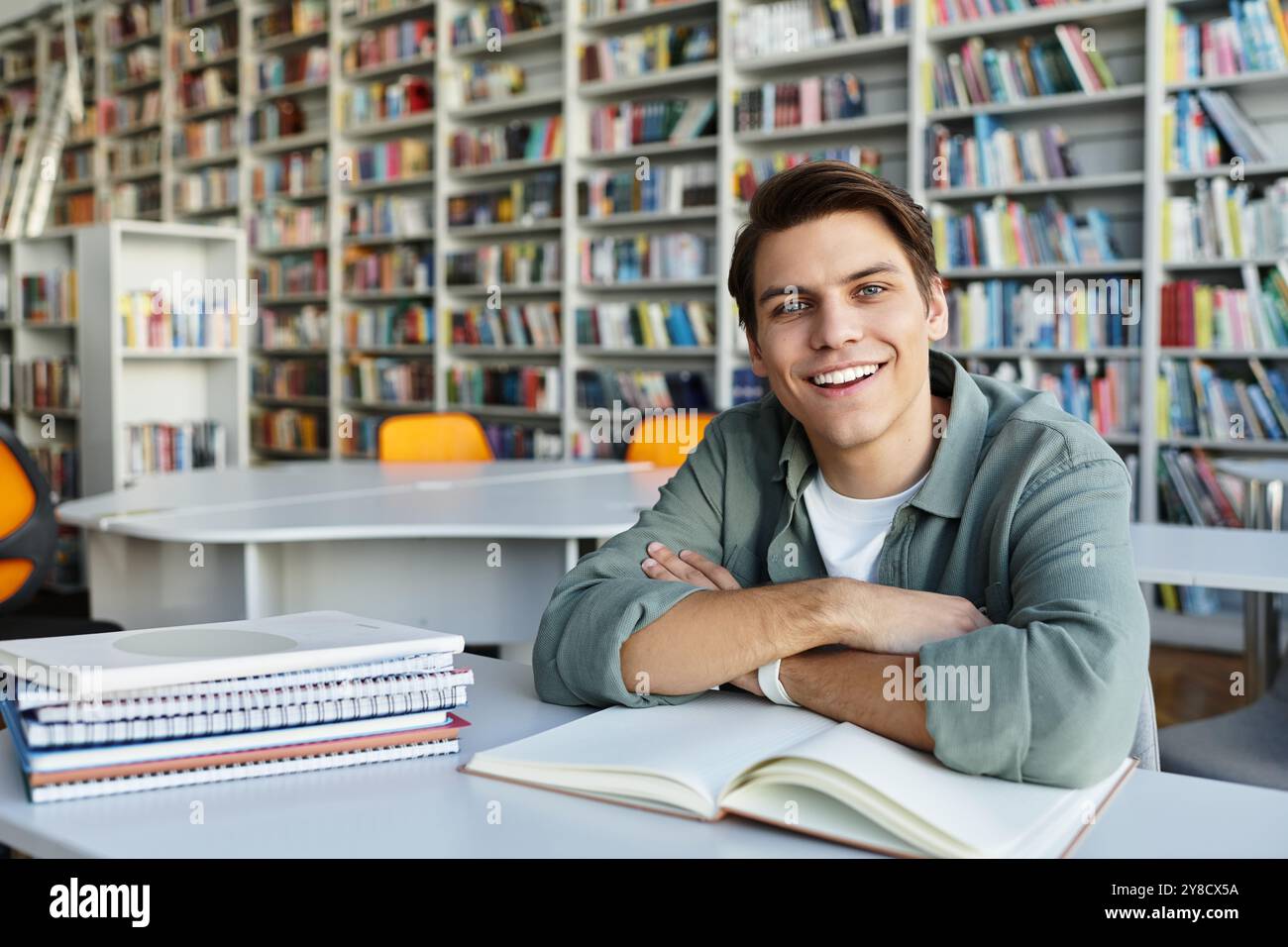 Handsome student reading in hi-res stock photography and images - Alamy