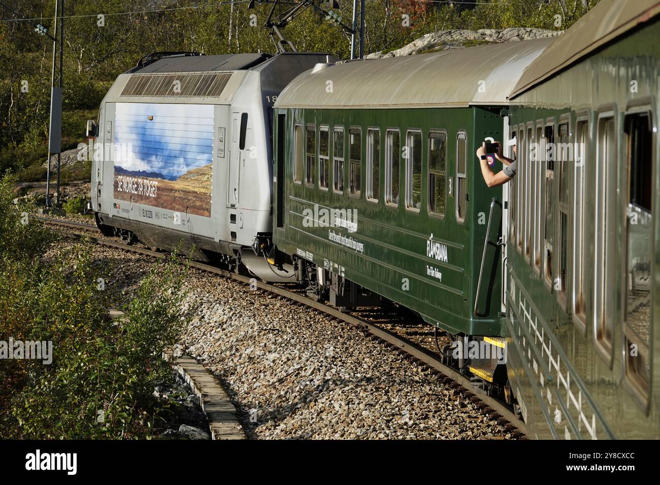 6th September, 2024 - Southern Norway Tourist passenger takes a photo ...