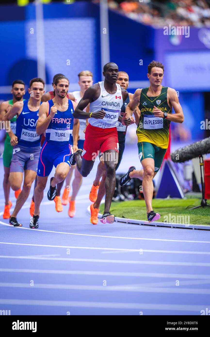 Marco Arop participating in the 800 meters at the Paris 2024 Olympic ...