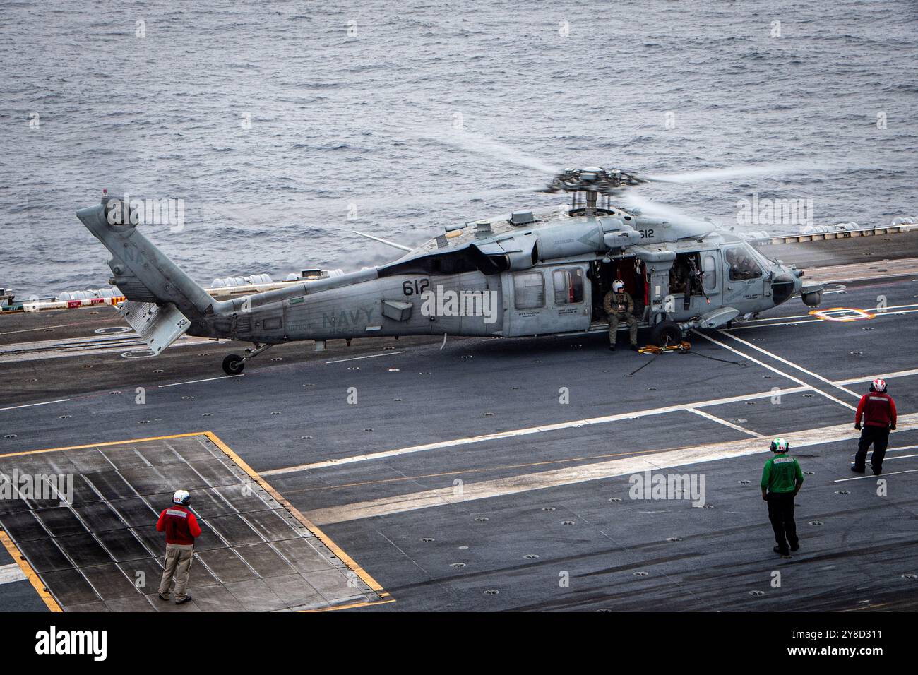An MH-60S Sea Hawk helicopter from the “Screamin’ Indians” of ...