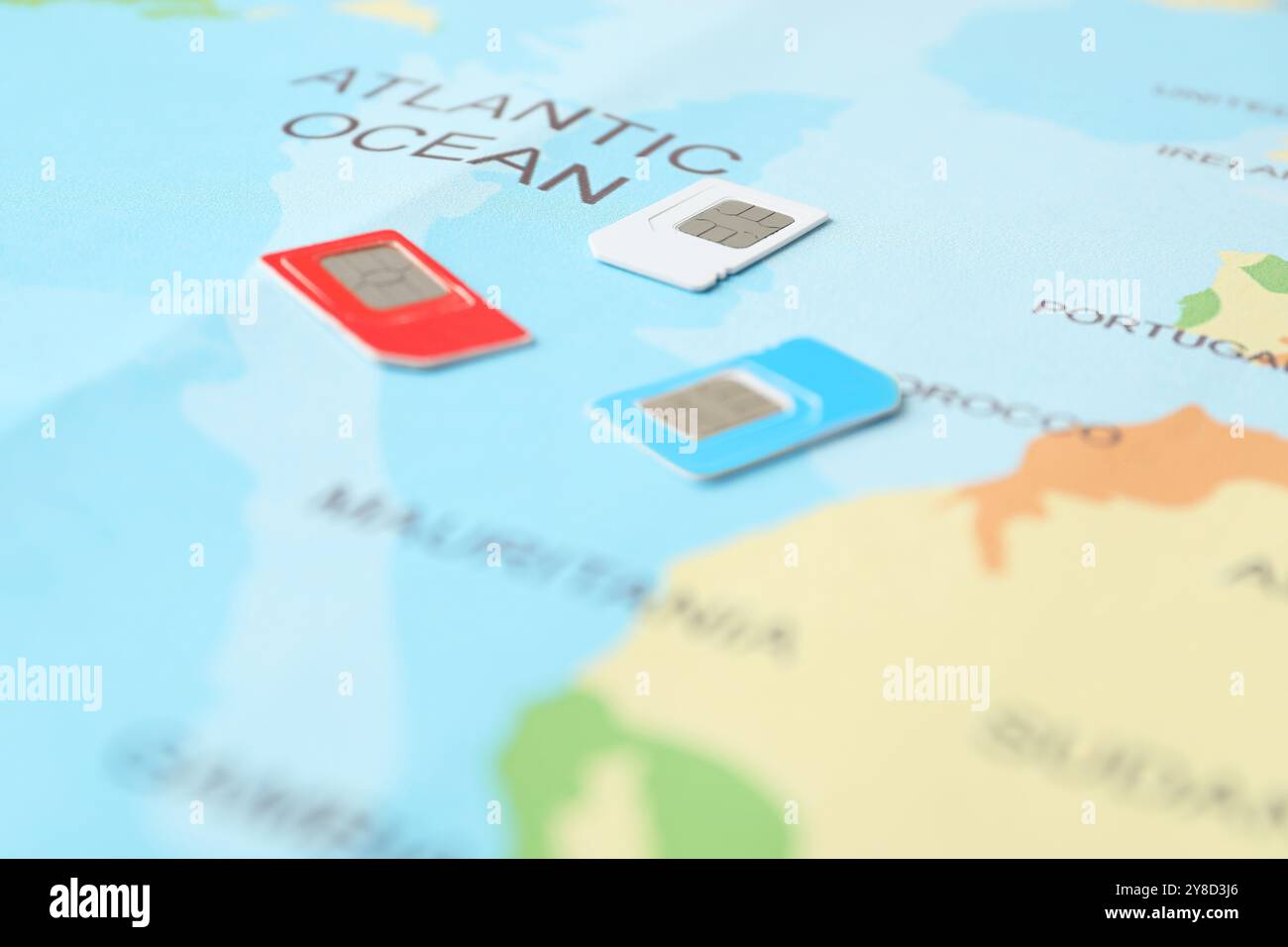 Group of SIM cards on world map, closeup Stock Photo - Alamy