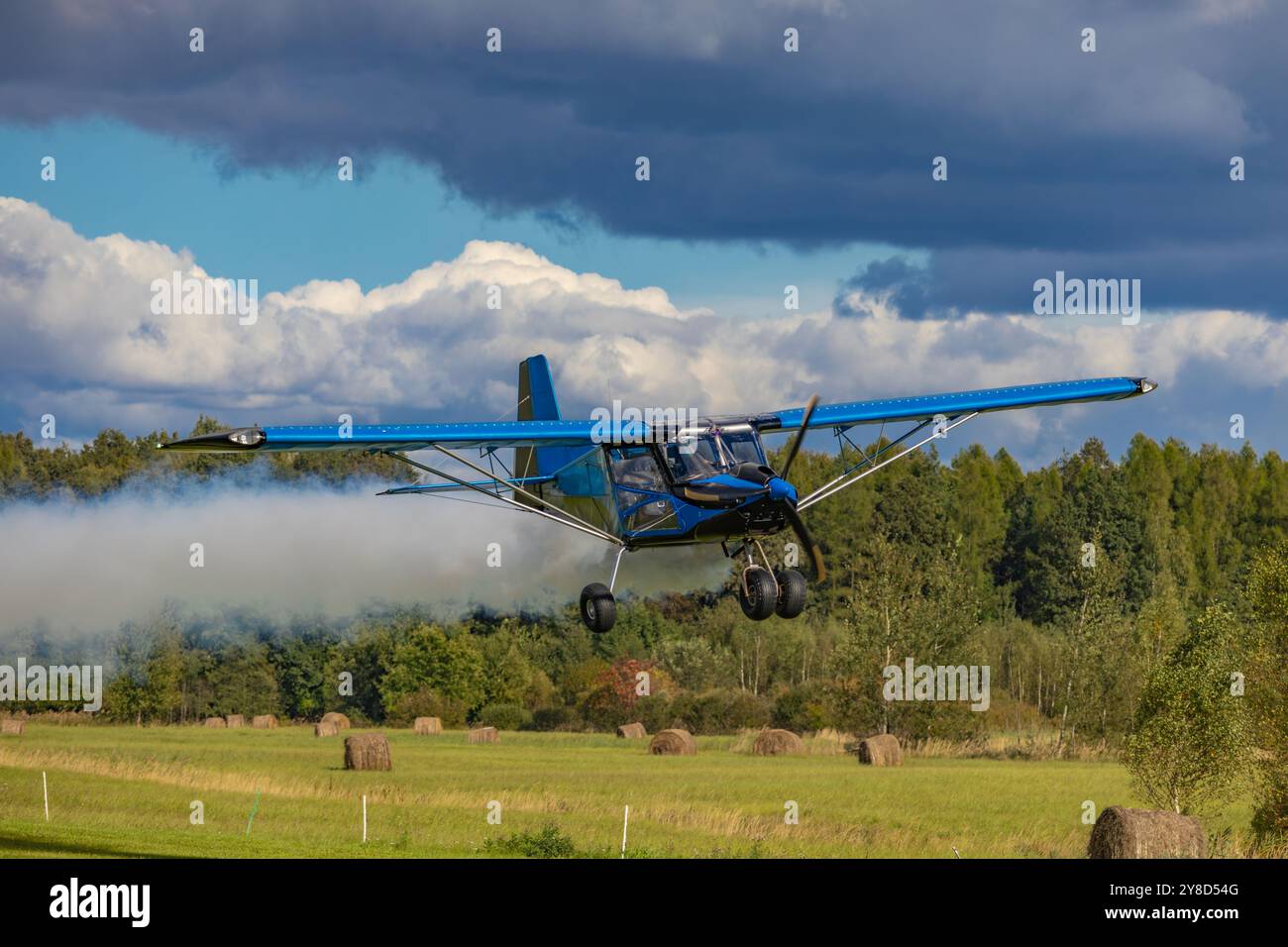 A display of low-flying planes over the airport, ultralight planes, and ...