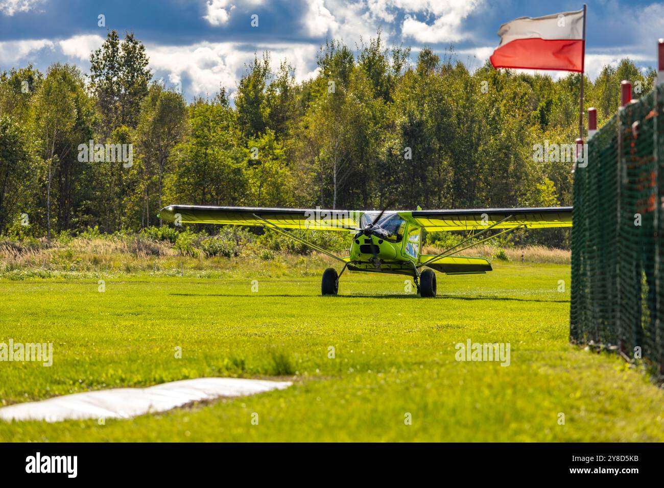 A display of low-flying planes over the airport, ultralight planes, and ...