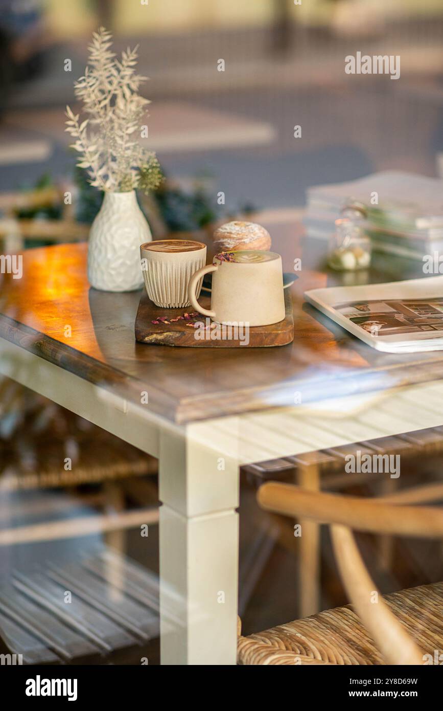 In chic cafe bathed natural hi-res stock photography and images - Alamy