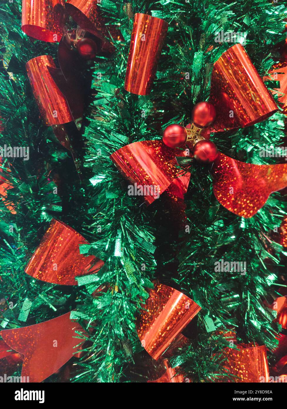 Tied red ribbon on garland hi-res stock photography and images - Alamy