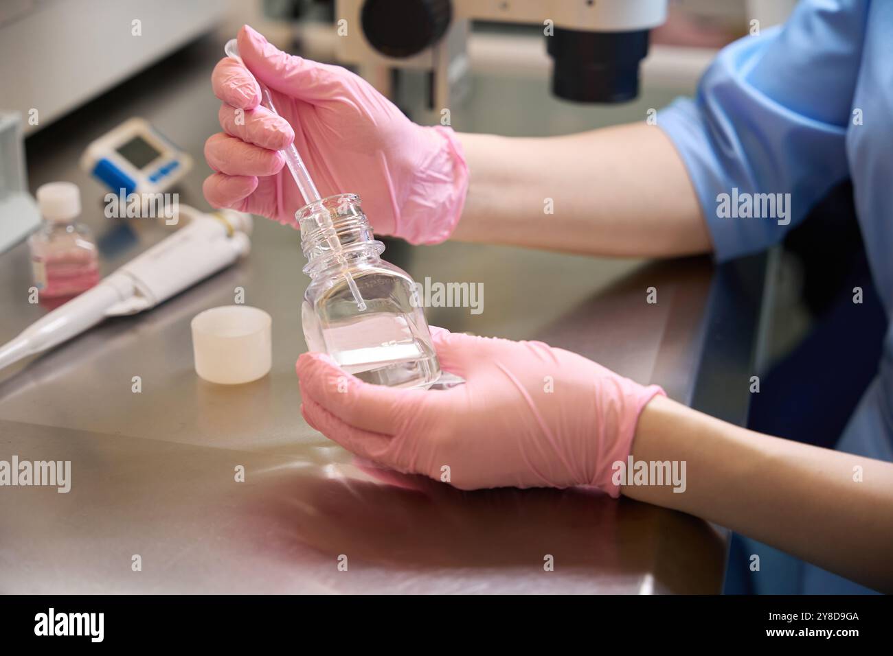 Analyzing liquid sample scientist data hi-res stock photography and ...
