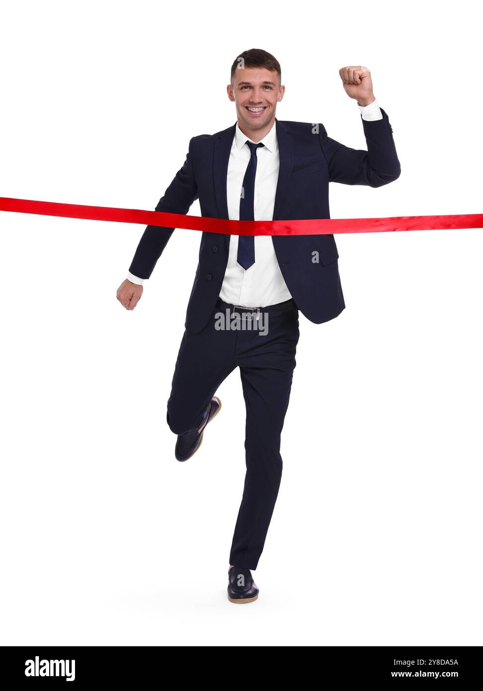 Businessman in suit crossing red finish line on white background Stock ...
