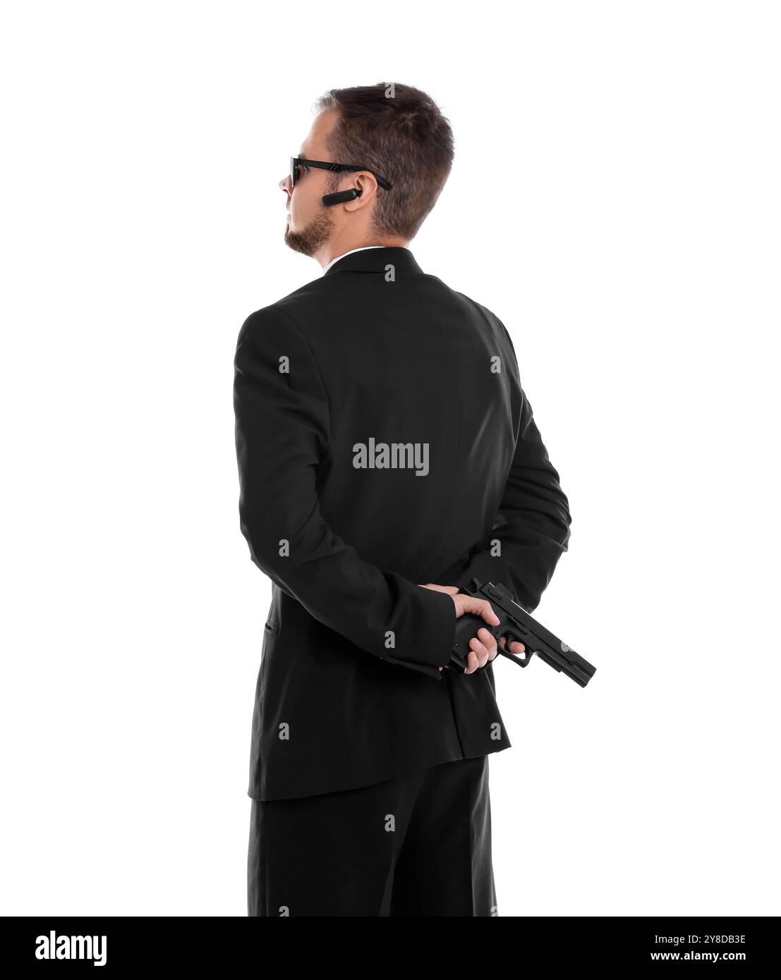 Bodyguard in suit with gun isolated on white Stock Photo - Alamy