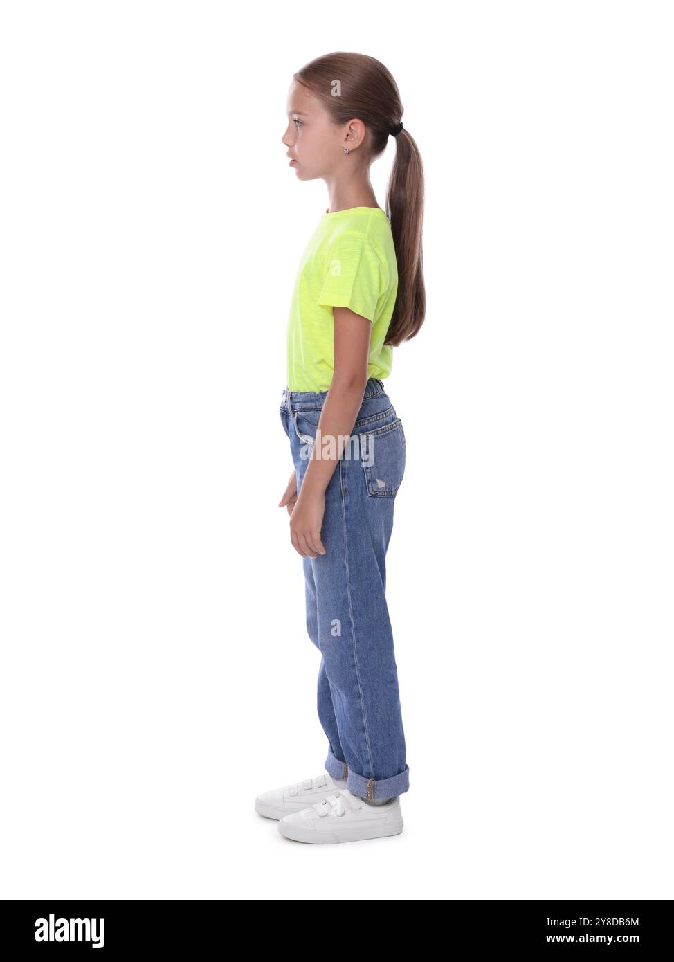 Girl with correct posture standing on white background Stock Photo - Alamy