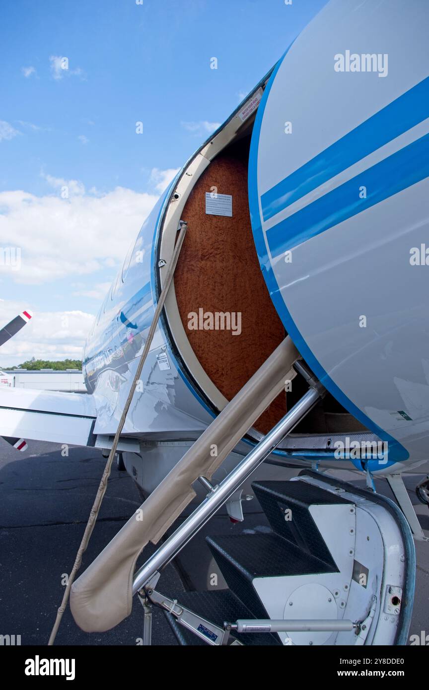 Boarding steps on side of aircraft Stock Photo - Alamy