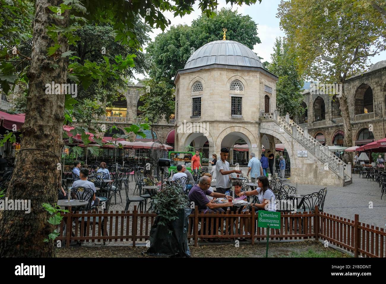 Bursa, Turkey - September 7, 2024: Koza Han tea gardens and mosque in ...