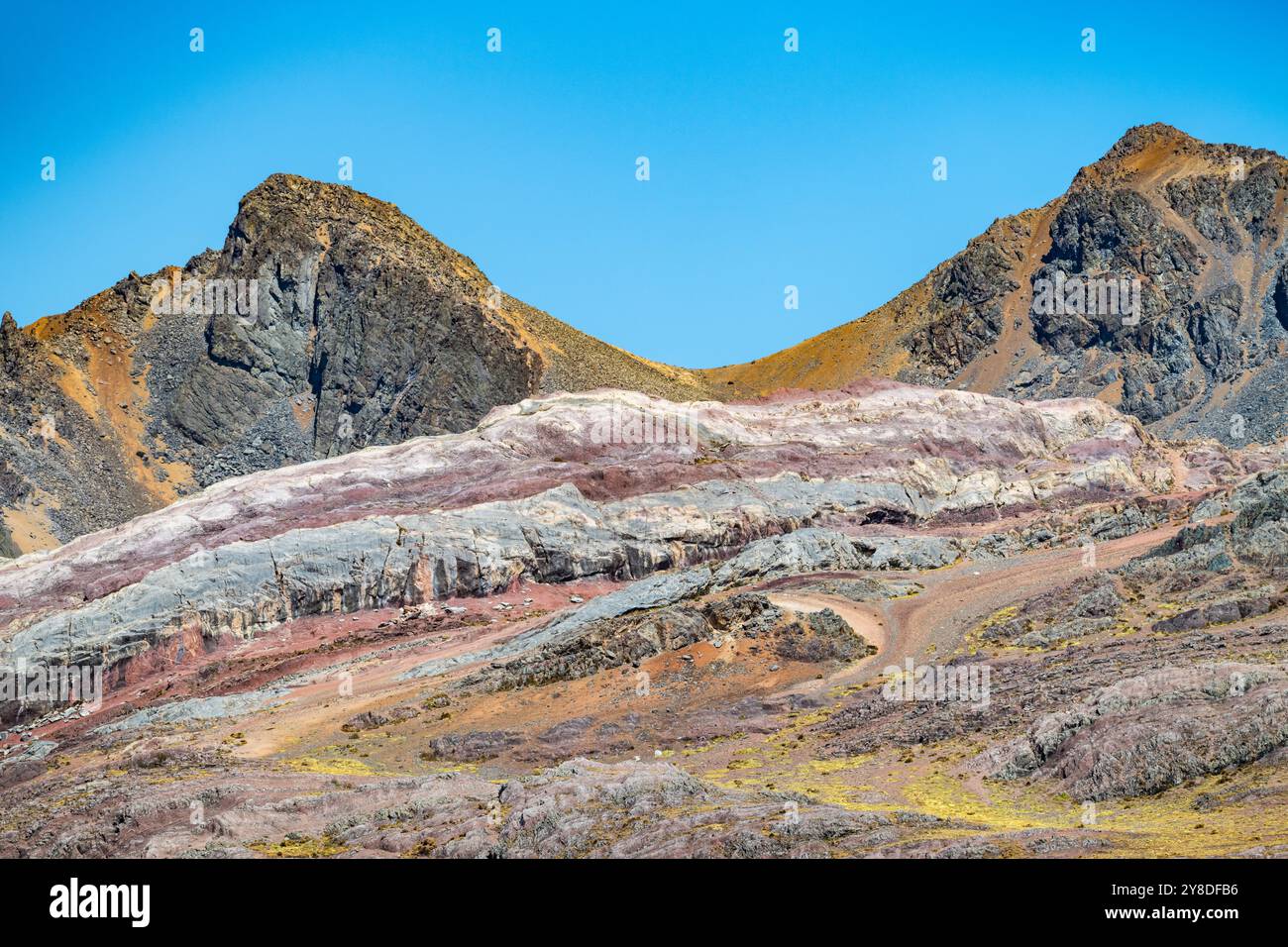 Layers of rocks in various colors in the high Andes mountains. Peru ...
