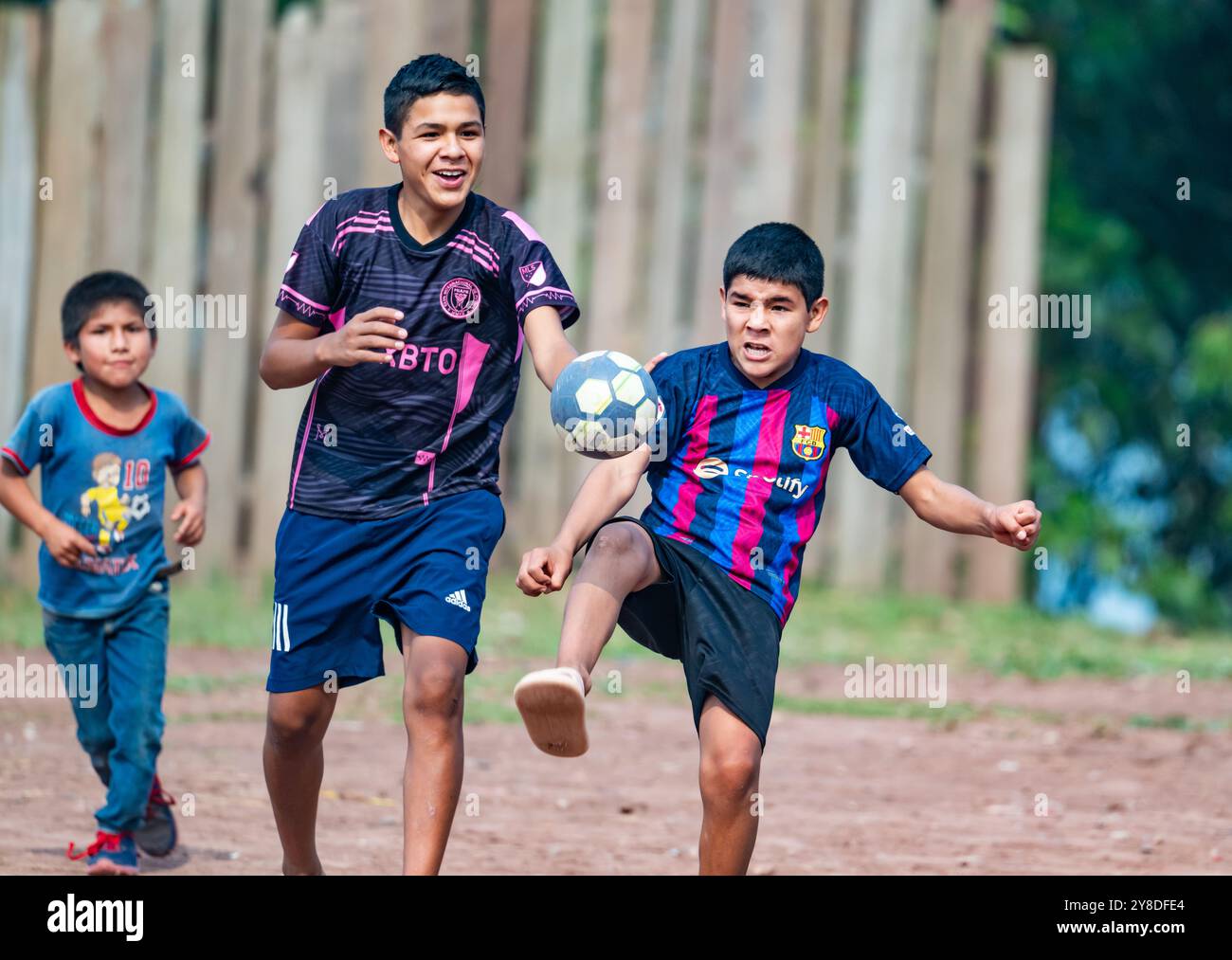 Boys play football in a remote village. Peru, South America Stock Photo ...