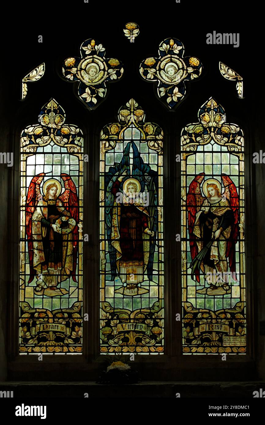 Victorian stained glass window with Peace, Victory and Rest. St John ...