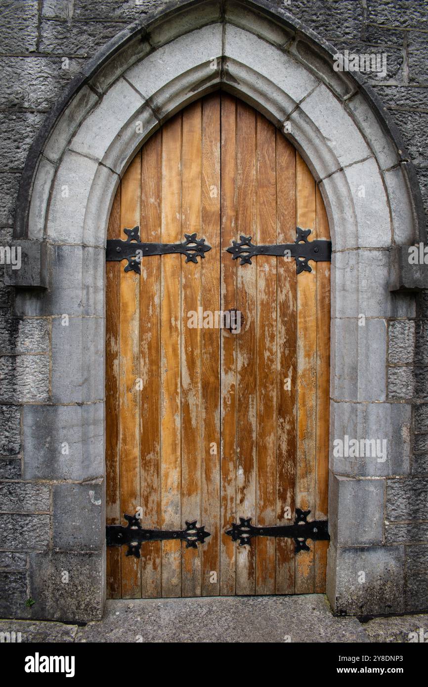 Arched back entrance to a church in Newcastle West, old wooden gothic ...