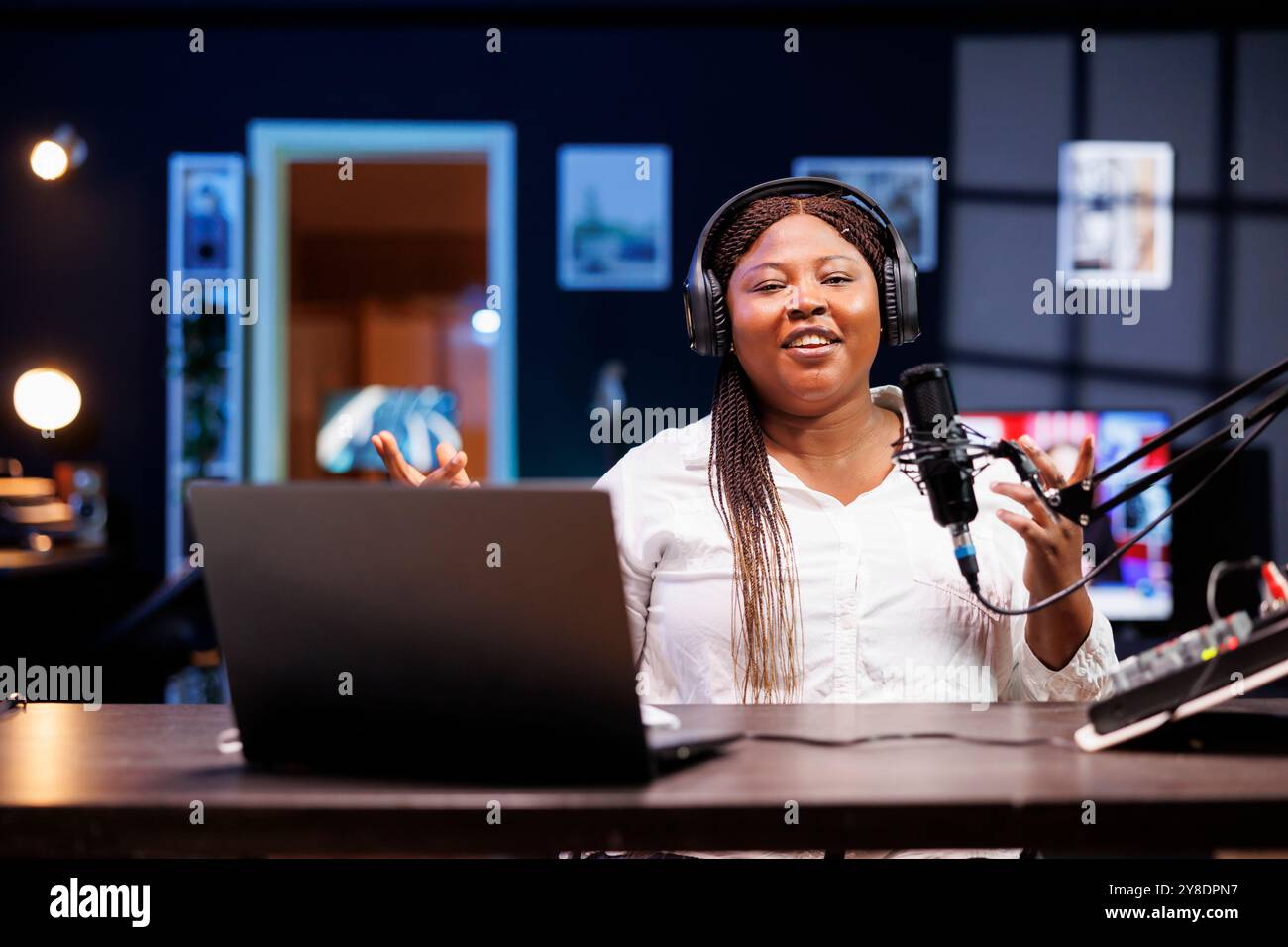 African american socialist using professional recording equipment at ...