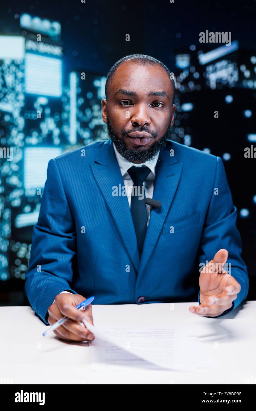 TV newscaster presenting live events on television network to create ...