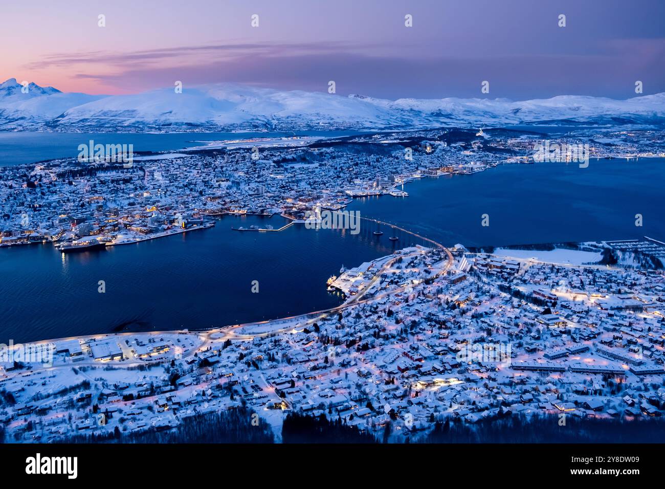 Aerial view of Tromso, Norway with city lights in winter from ...