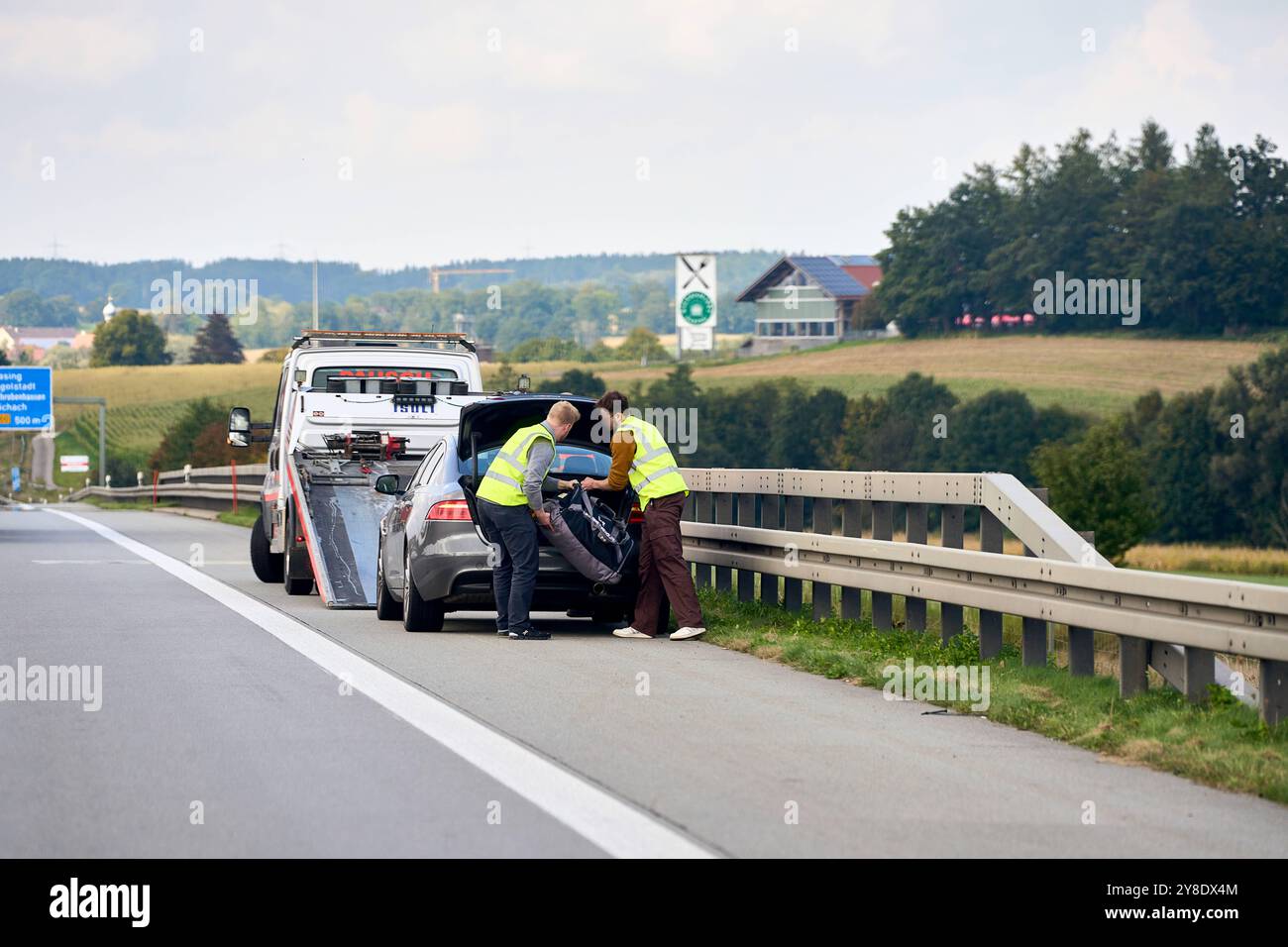 Dasing, Bavaria, Germany - September 23, 2024: Two people in high ...
