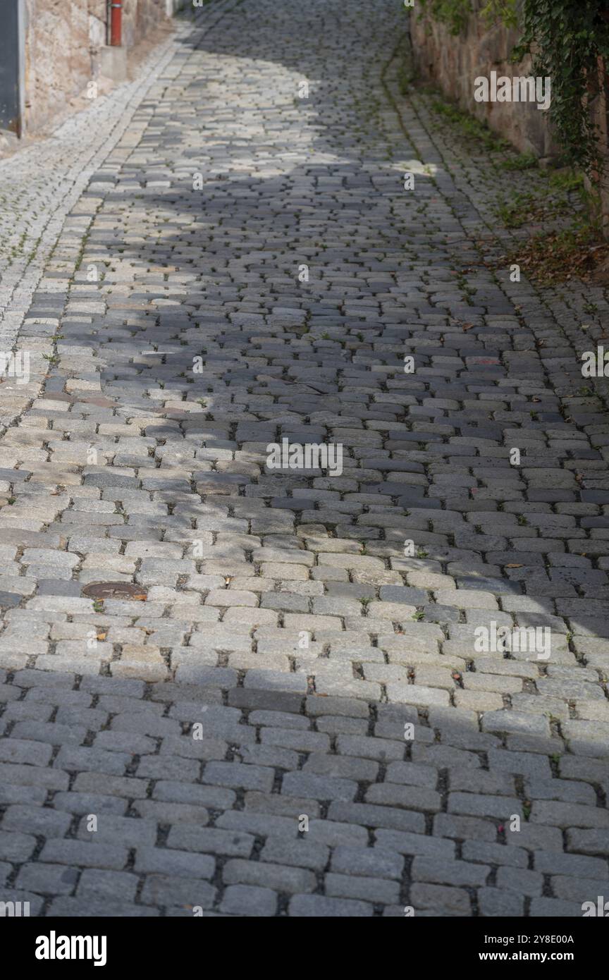 Street paving with basalt stones in the old town centre, Kulmbach ...