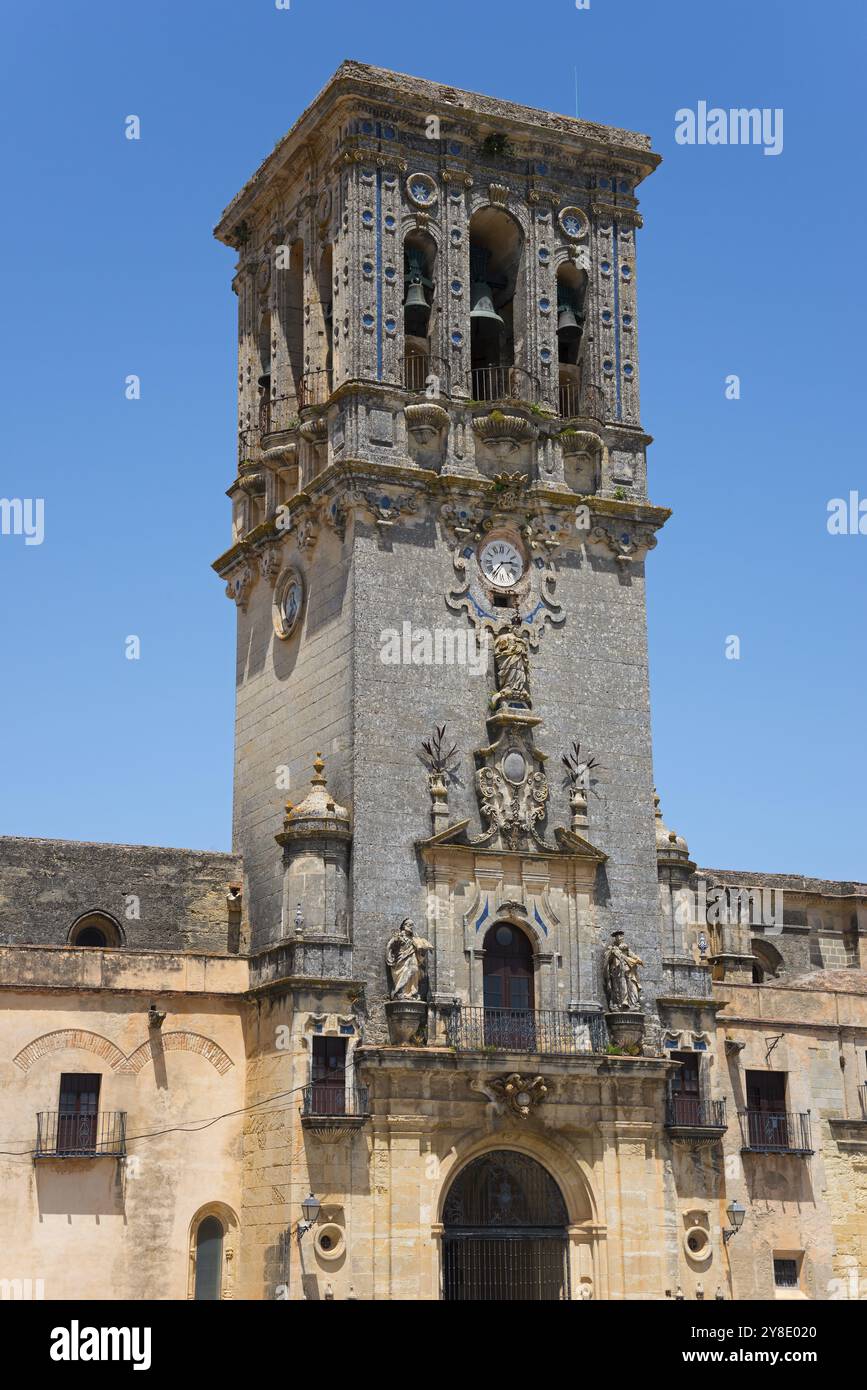 Historic bell tower with intricate sculptures, a clock and detailed ...