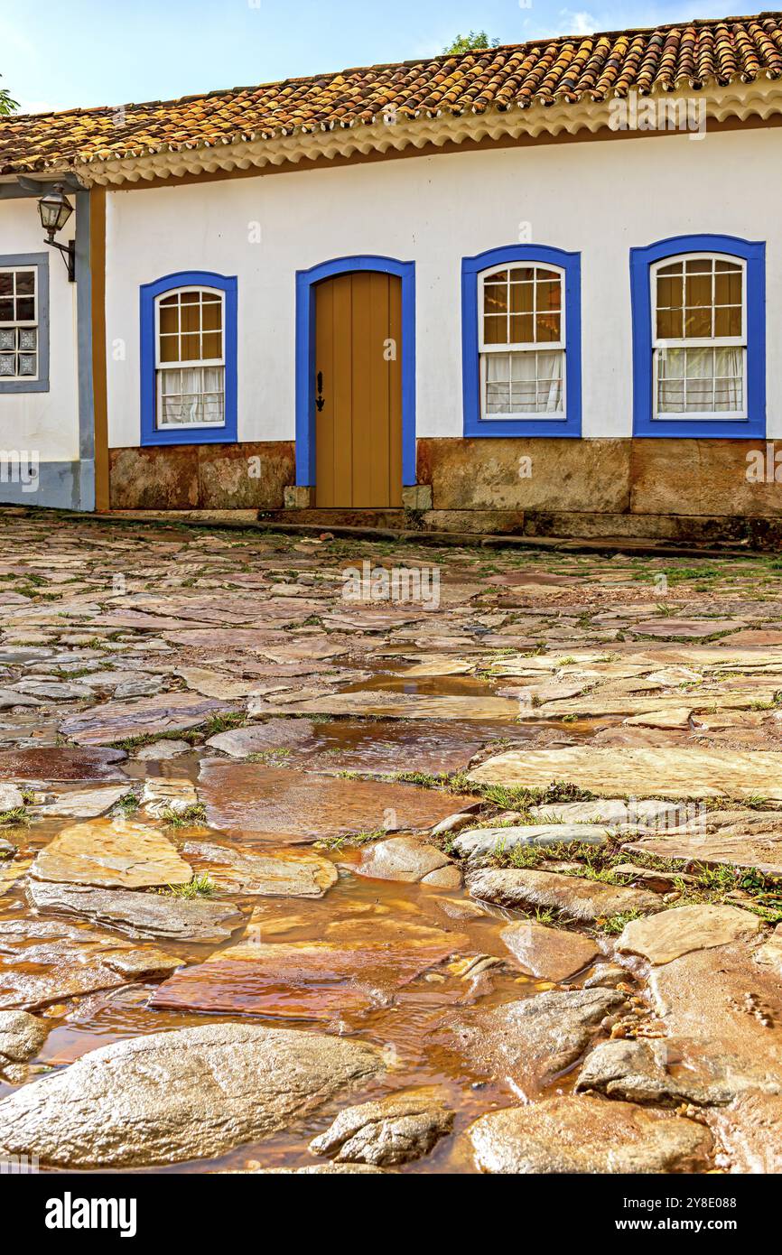 Cobblestone street and colonial architecture houses in the historic ...
