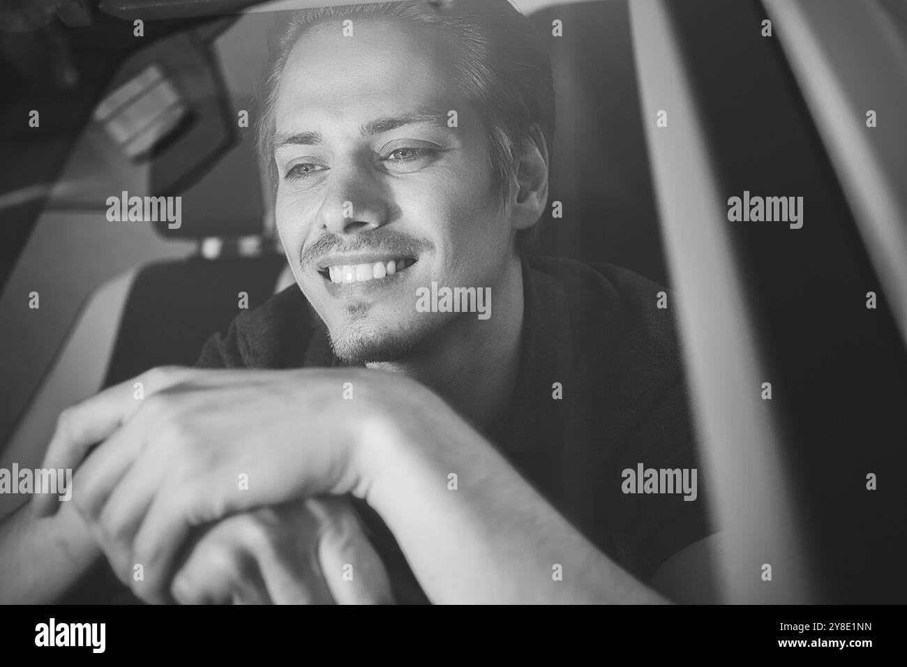 Guy drives car Black and White Stock Photos & Images - Alamy