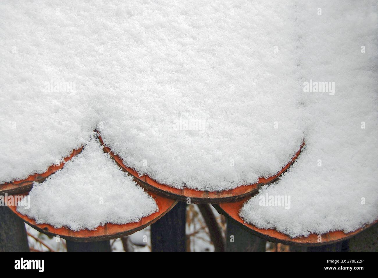 Snow covered tiles Stock Photo - Alamy