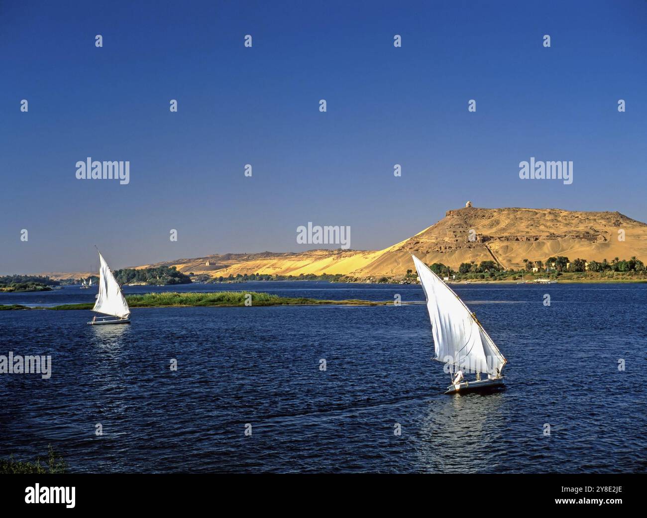 River Nile with feluccas in background monument to Aga Khan Stock Photo ...