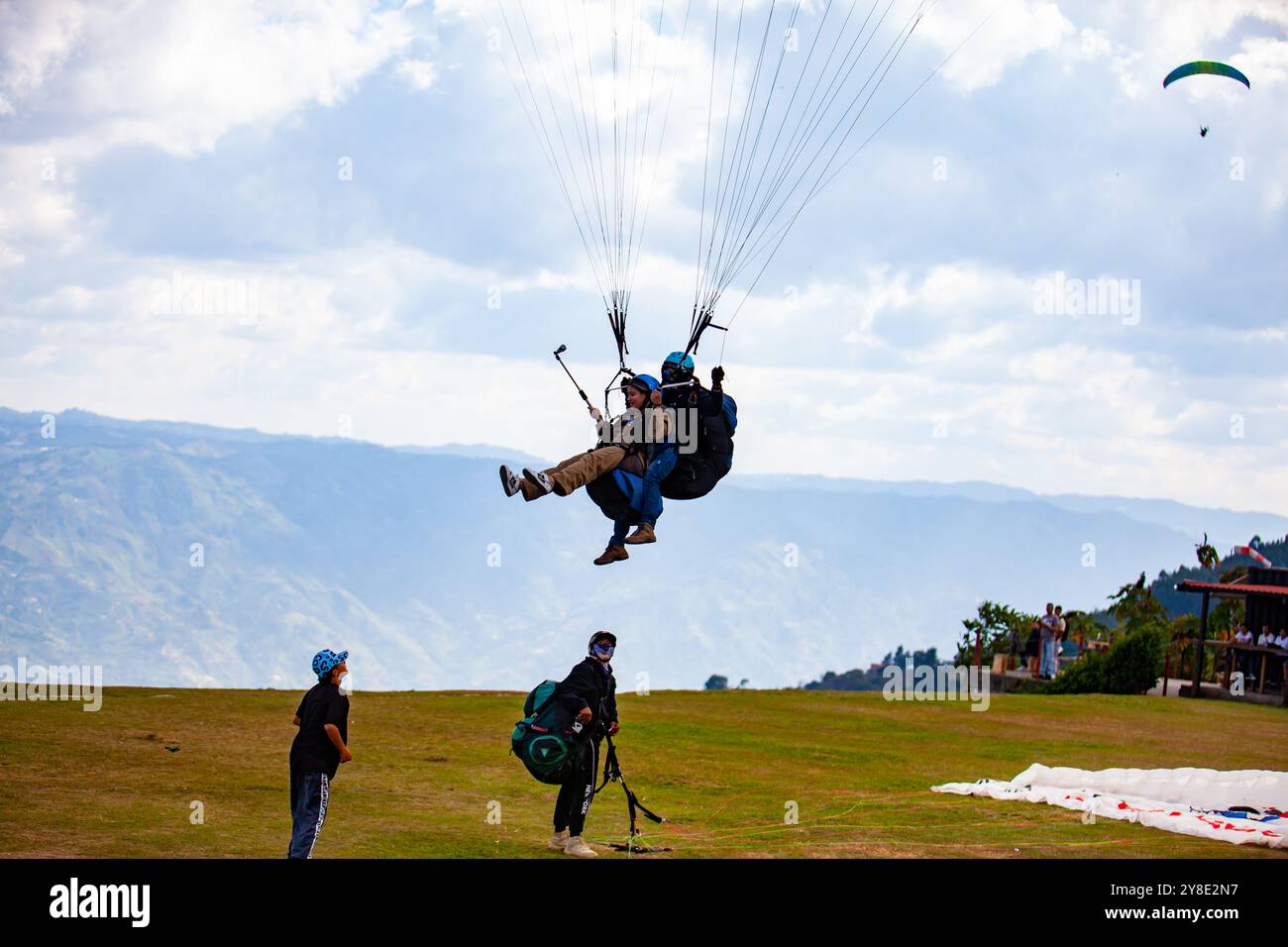 Barbosa, Antioquia, Colombia - January 21, 2024: People paragliding ...
