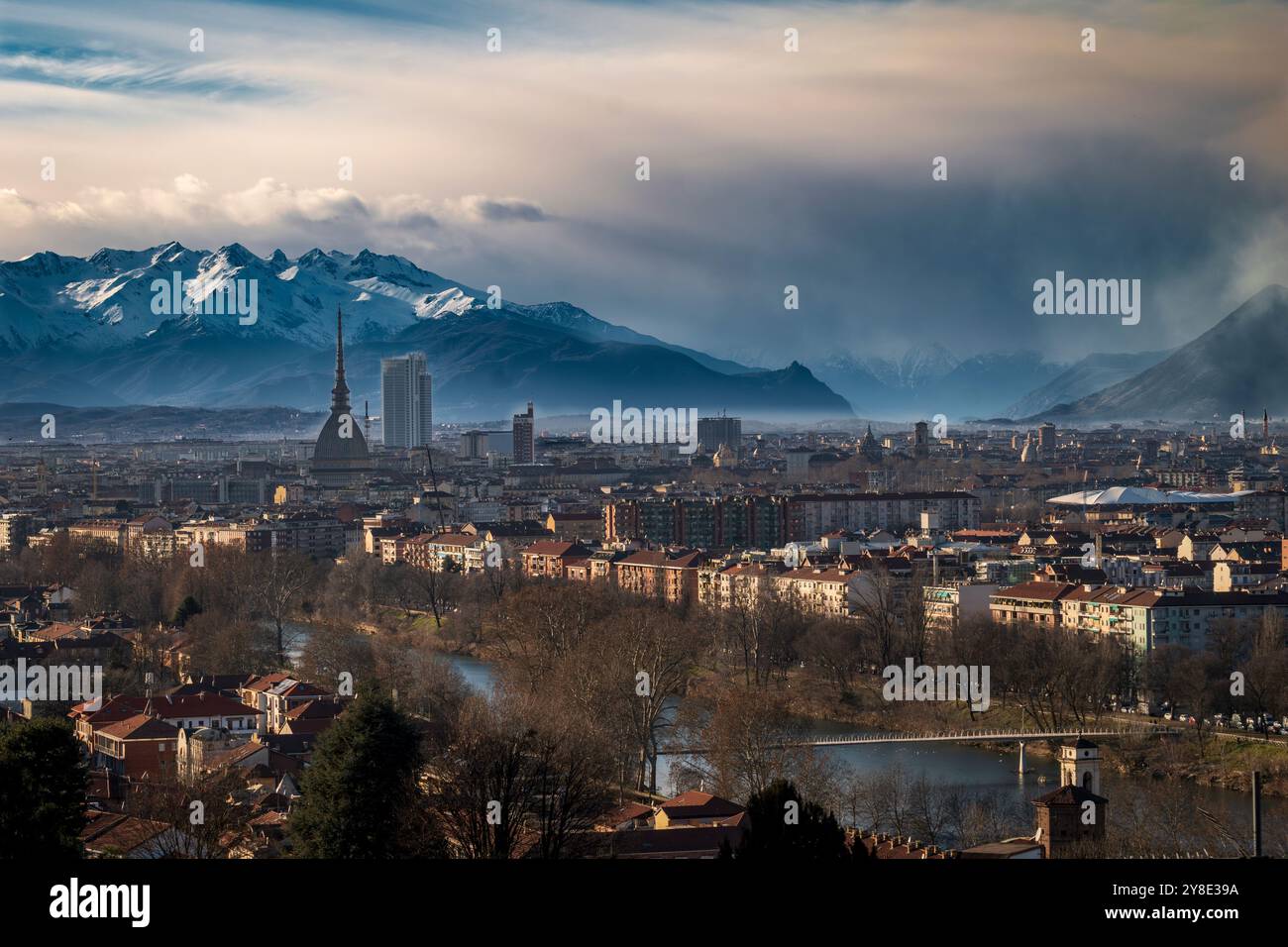 View of Torino with the iconic Mole Antonelliana and Valle Susa in a ...