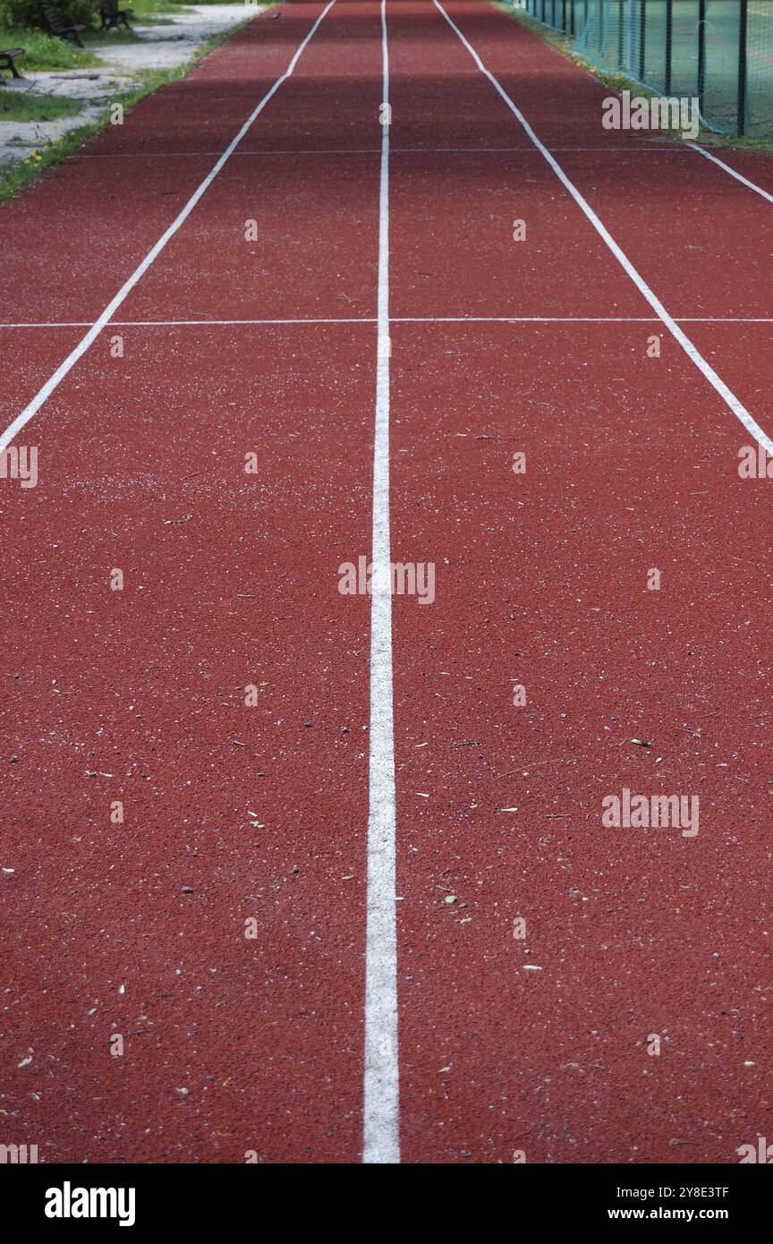 Running track in school yard Stock Photo - Alamy