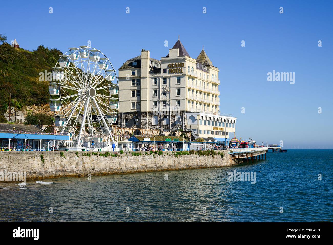 Llandudno, Wales, UK - September 17, 2024; Grand Hotel and ferris wheel ...