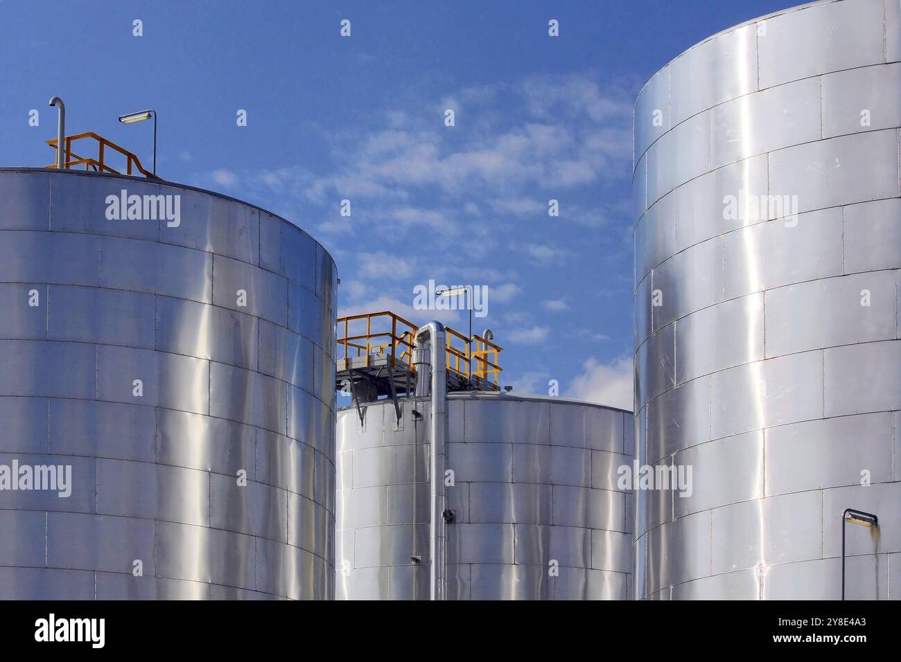 Metallic storage tanks Stock Photo - Alamy