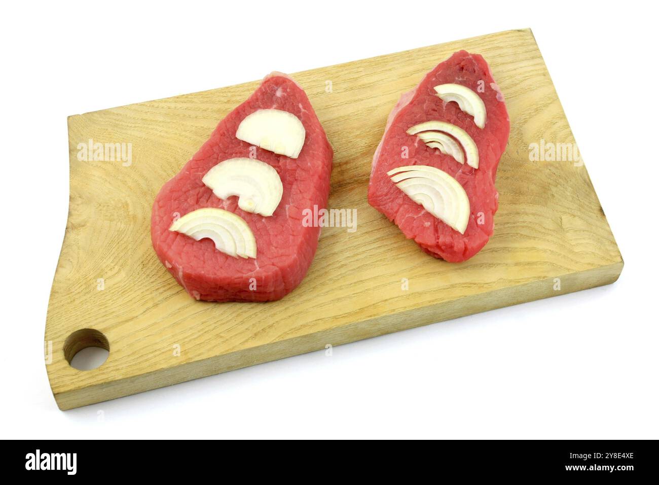 Raw meat on trencher Stock Photo - Alamy