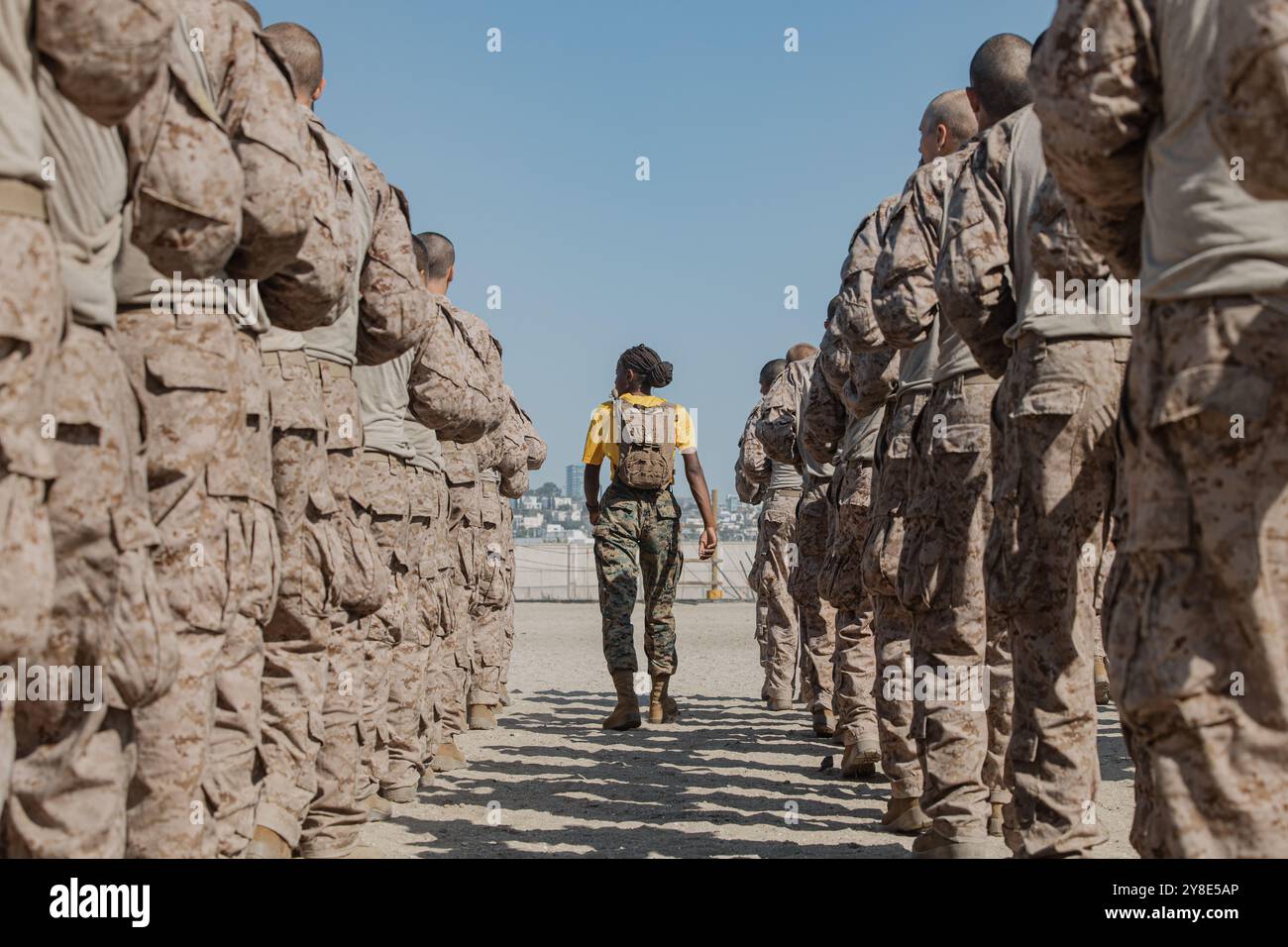 U.S. Marine Corps Sgt. Gaelle Juste, center, a drill instructor with ...