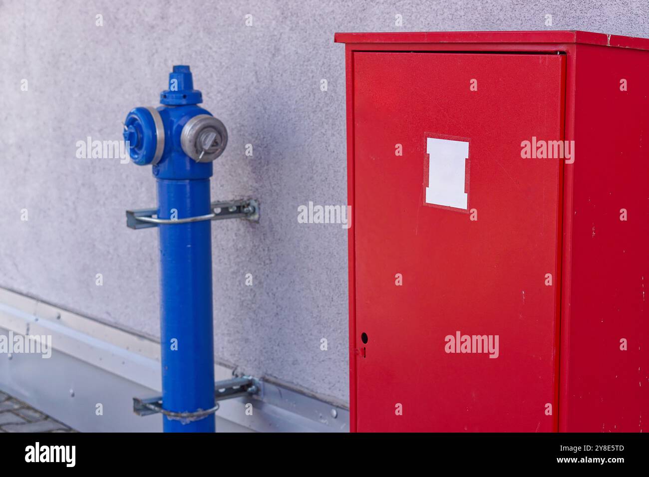 Water pipe hydrant and red box with fire equipment Stock Photo - Alamy