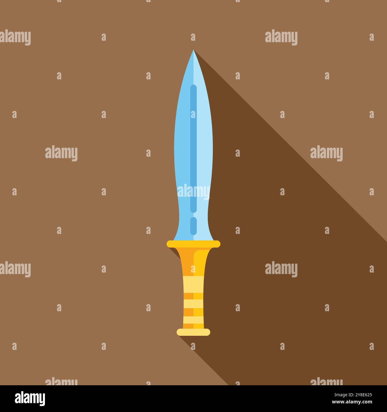 Sharp metal dagger with a golden hilt is pointing upwards on a brown ...