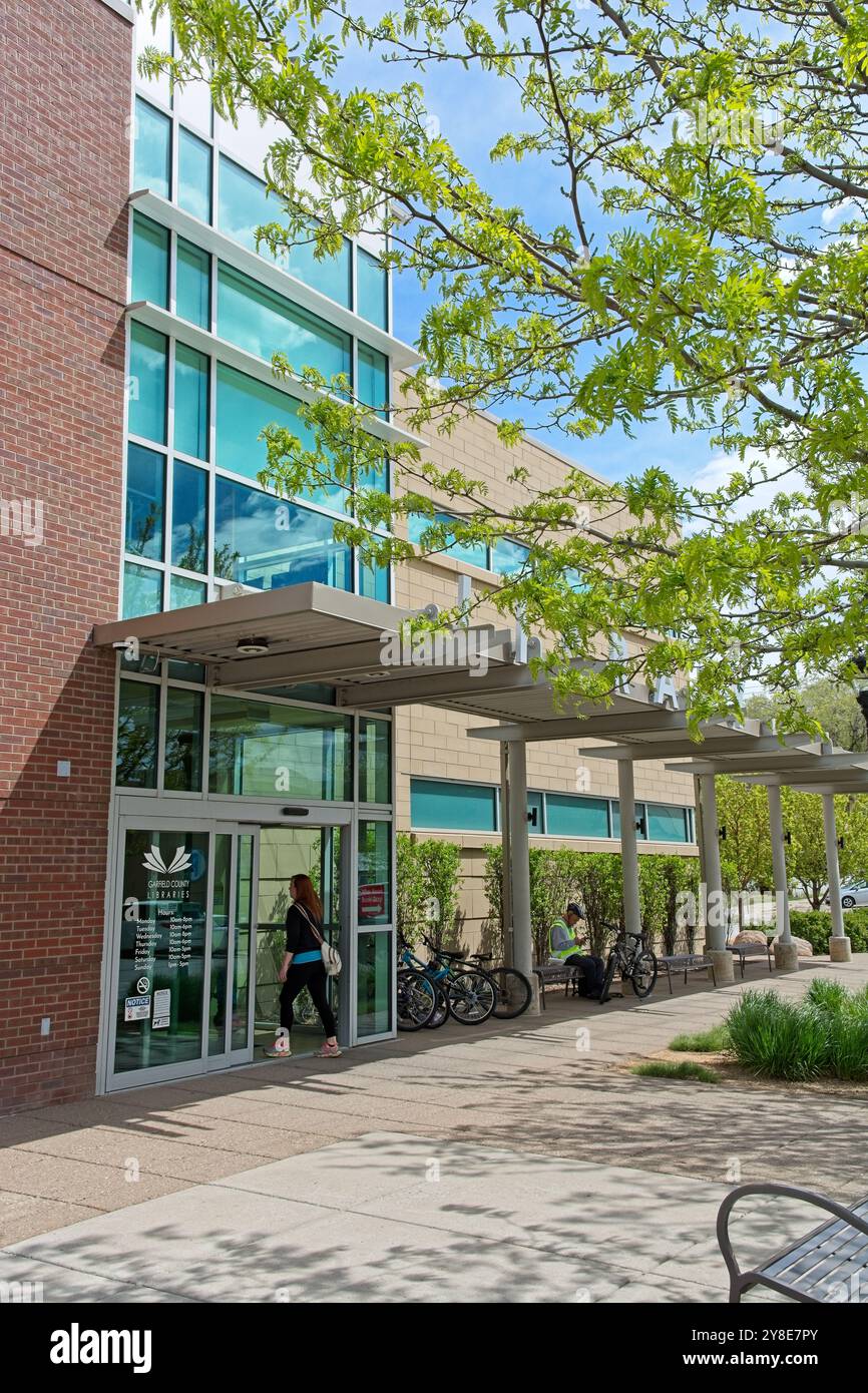 Patron enters modern Rifle Branch Library, part of the Garfield County ...