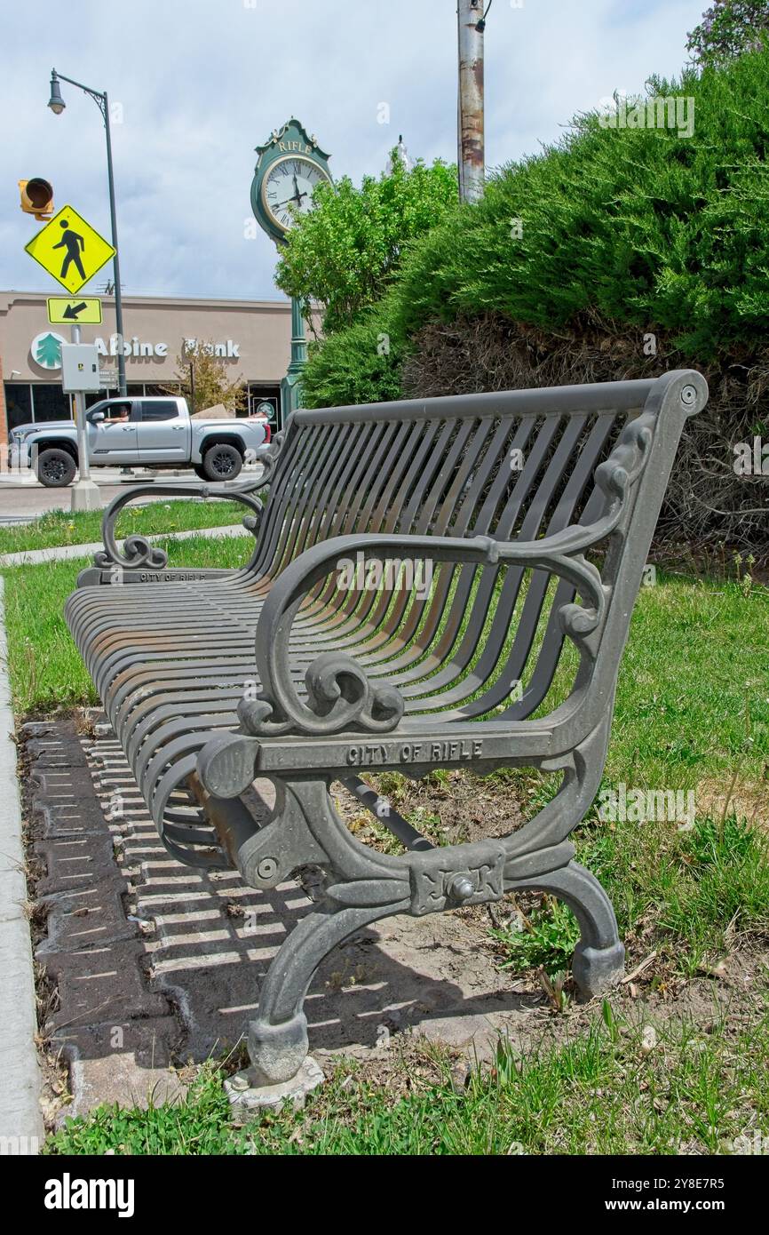 Park bench at corner of East Fourth street and Railroad Ave in downtown ...