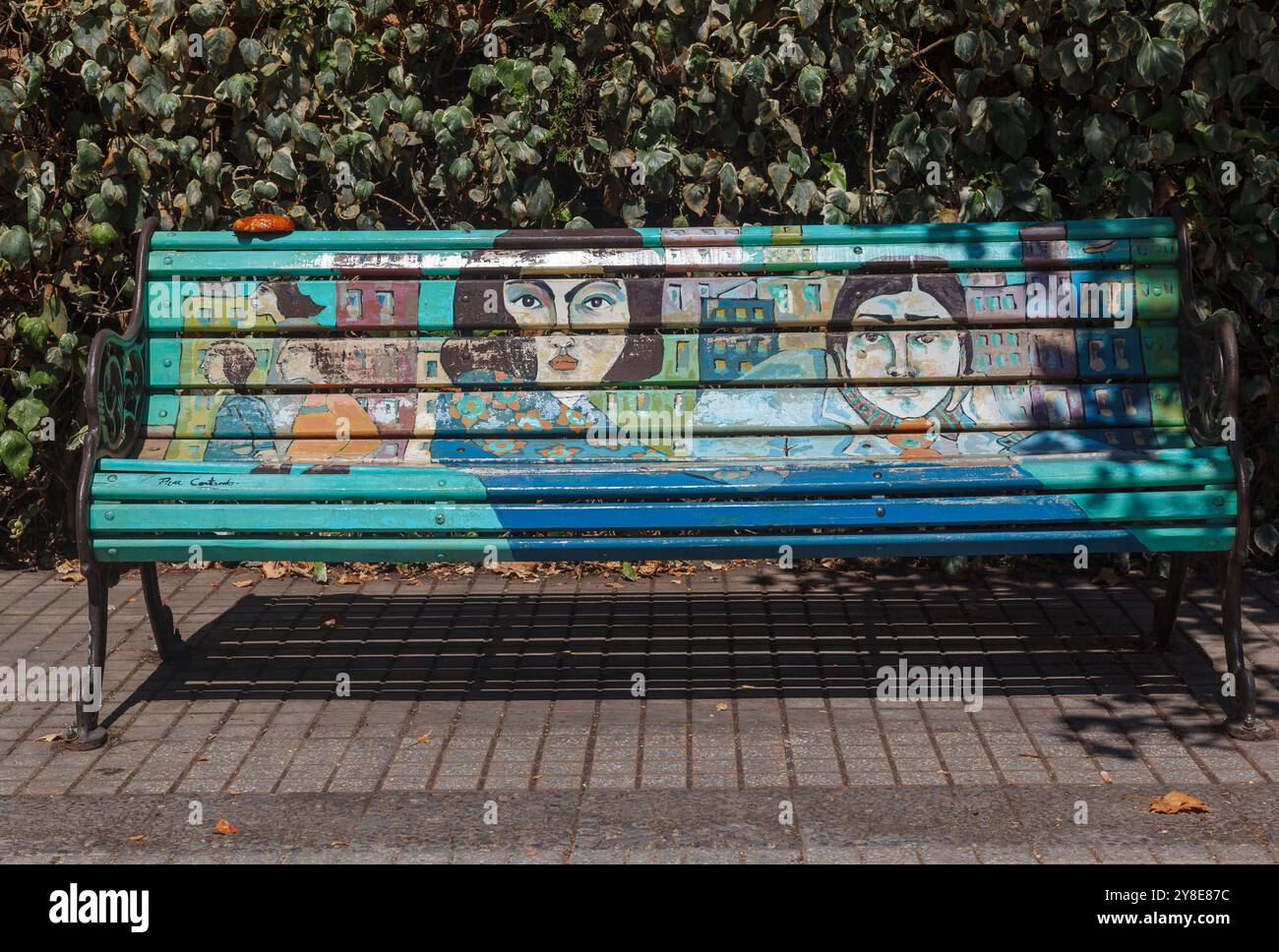 Wood Bench painted with modern art in the elegant El Golf neighborhood ...