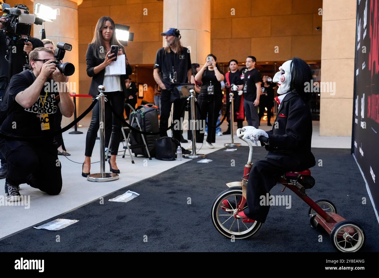 A remote controlled puppet poses for photographers at the 20th ...