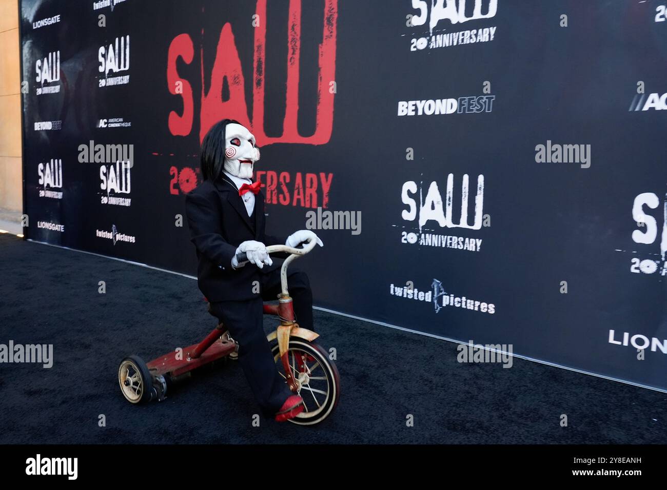 A remote controlled puppet poses for photographers at the 20th ...