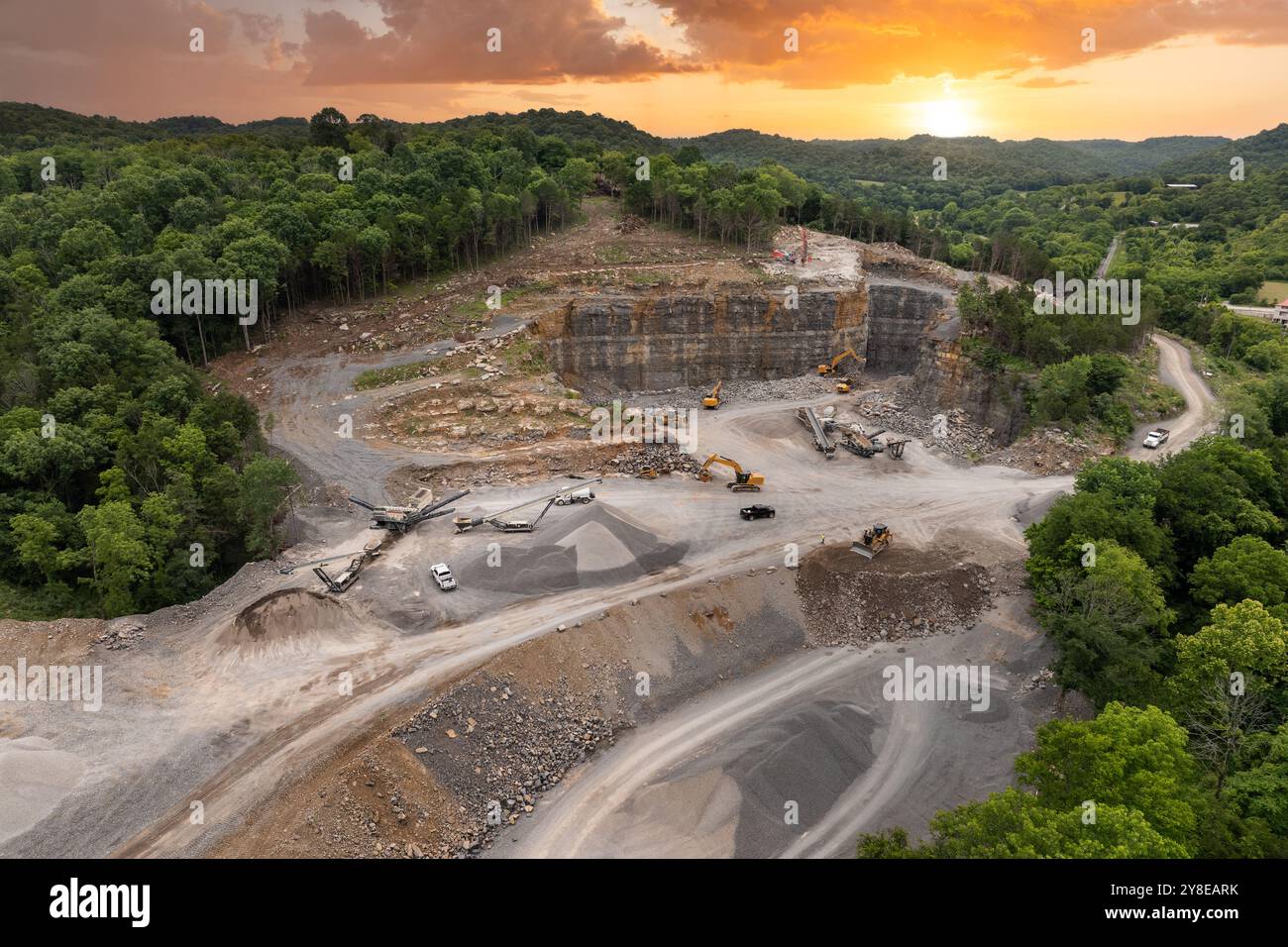Aerial view of open pit mining site of limestone materials extraction ...