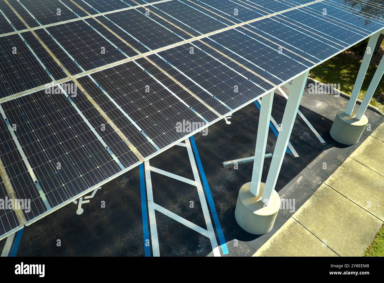 Solar panels installed over parking lot for parked cars for effective ...