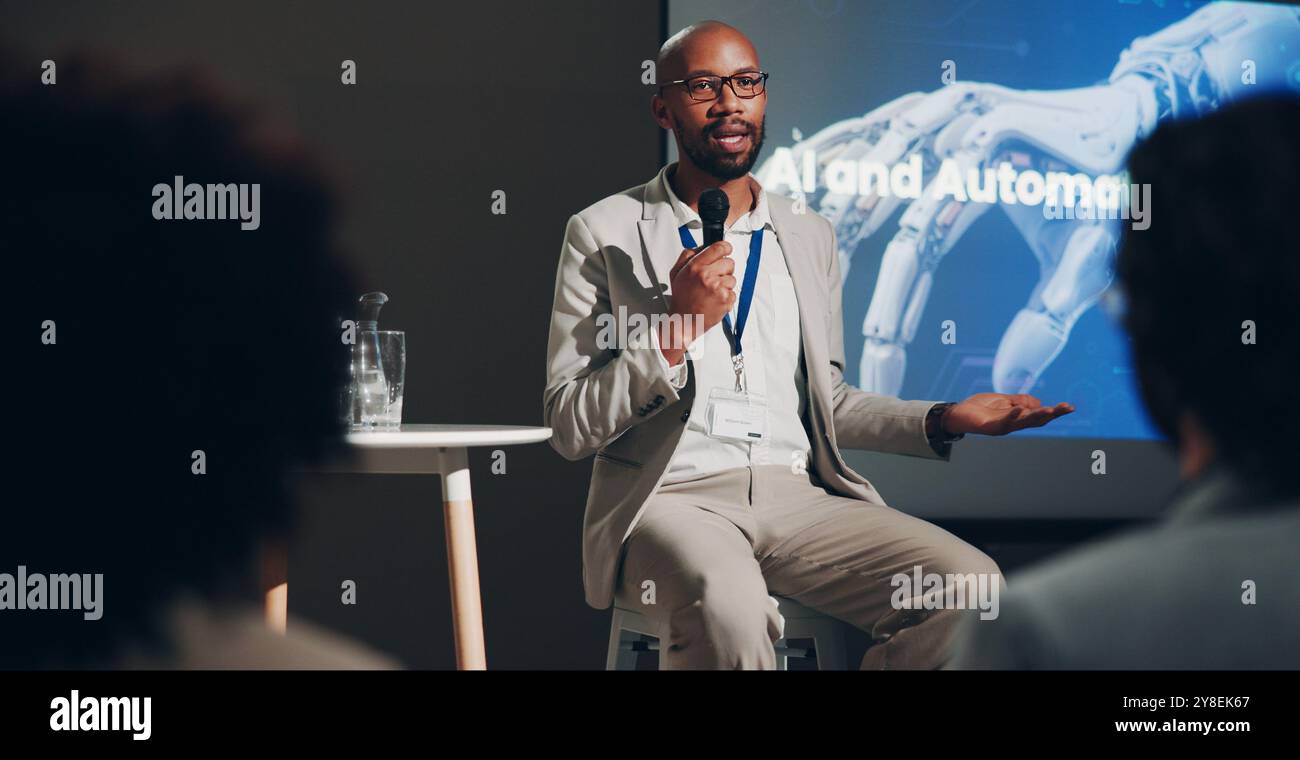 Black man, stage and microphone at conference for technically and AI ...